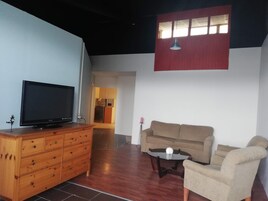 Apartamento conforto, 3 quartos | Área de estar