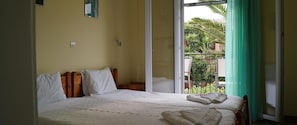 Apartamento, 2 quartos | Vista do quarto