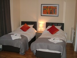 Apartamento Empresarial, 1 quarto | 1 quarto, lençóis de algodão egípcio, roupa de alta qualidade 