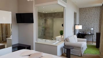 Suite Deluxe | Minibar, secretária, Wi-fi grátis, roupa de cama fornecida
