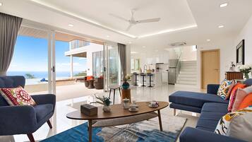 3 Bedroom Villa with Ocean View | Área de estar | TV de tela plana 65 polegadas com canais a cabo, smart TV, filmes pagos