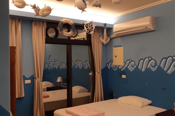 Quarto quádruplo standard | Cortinas blackout, Wi-Fi de cortesia, roupa de cama