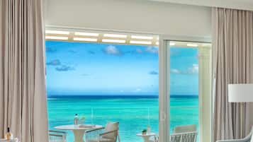 Suite, 1 cama king-size e sofá-cama, em frente à praia | Vista para a praia ou o mar