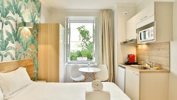 Estúdio conforto | Roupas de cama premium, camas Select Comfort, cofres nos quartos