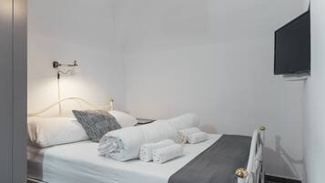 Estúdio conforto | Escrivaninha, Wi-Fi de cortesia, roupa de cama