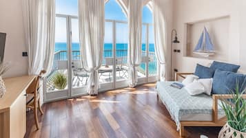 Suite Executiva, vista para o oceano, em frente ao mar | Sala de estar | TV de ecrã plano, filmes pagos