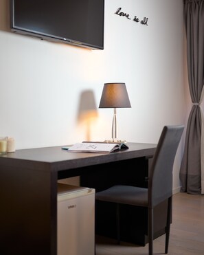 Quarto Deluxe | Roupa de alta qualidade, minibar, Wi-fi grátis, roupa de cama fornecida