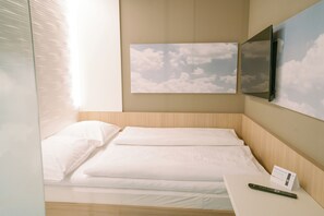 Secretária, quartos insonorizados, Wi-fi grátis