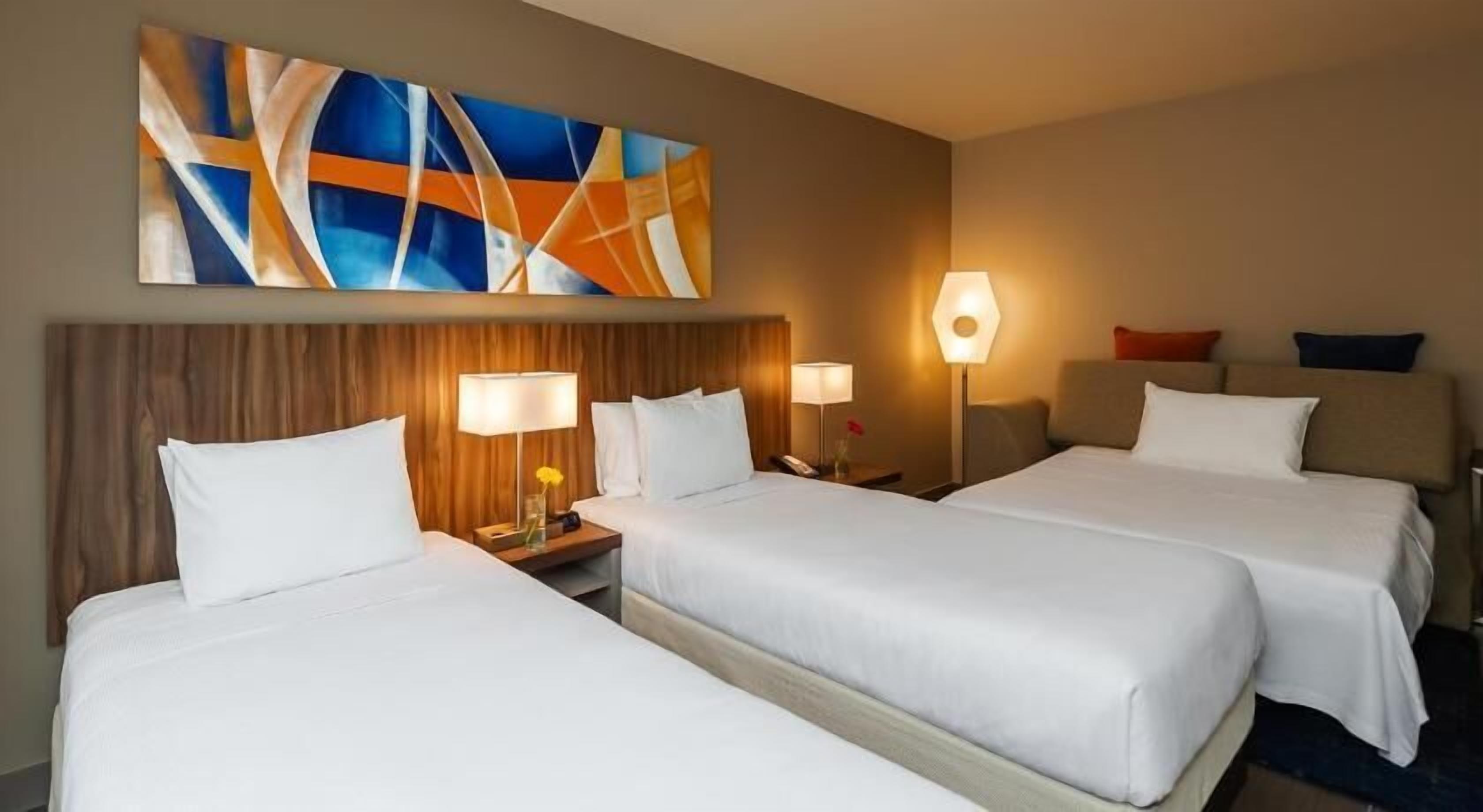 Roupas de cama premium, edredons de pluma, frigobar, cofres nos quartos