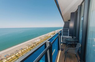Suíte panorâmica, cozinha, vista para o mar | Sacada