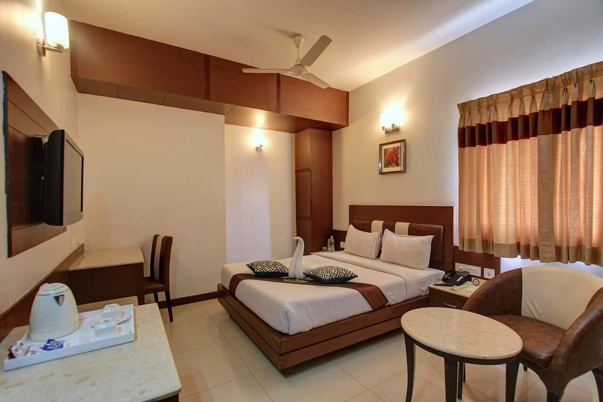 Roupas de cama premium, cofres nos quartos, individualmente mobiliados
