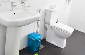 Um polibã, produtos de higiene exclusivos, um secador de cabelo 