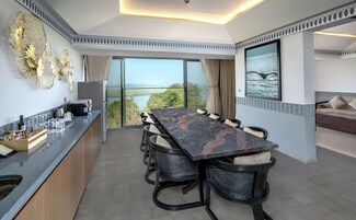 Suíte premium, vista para o rio | Sala de jantar
