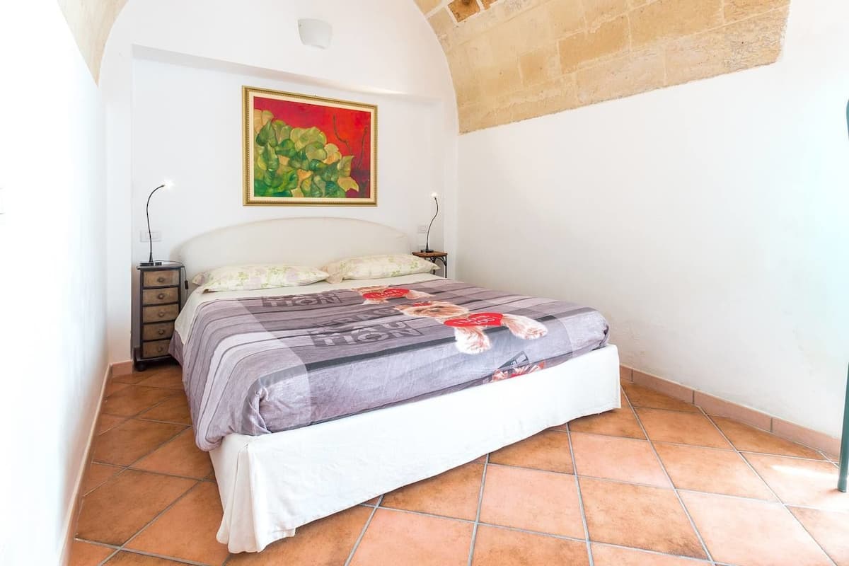 Suíte, várias camas, para não fumantes, cozinha | 1 quarto, roupas de cama premium, edredons de pluma