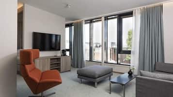 Suite Júnior | Sala de estar | Smart TV