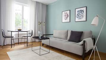 Apartamento Superior | Sala | TV de ecrã plano