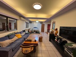 Apartamento Familiar, várias camas | Vista do quarto