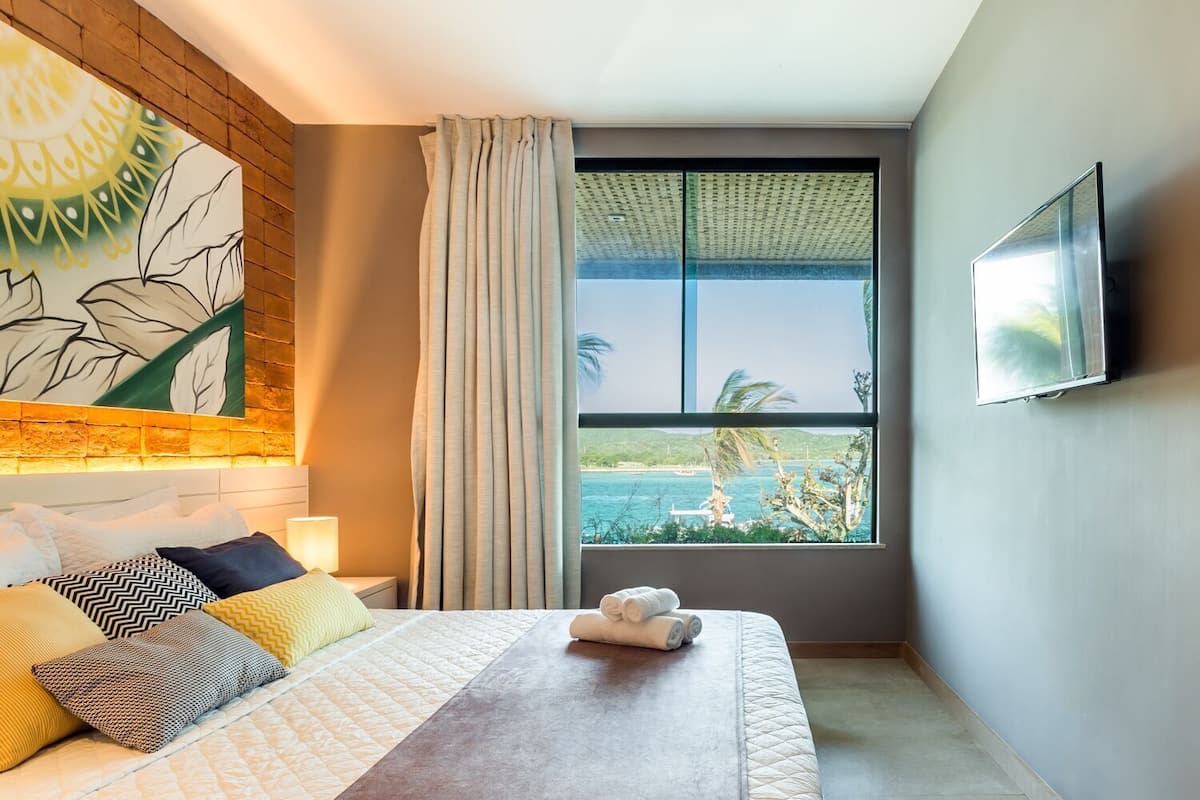 Frigobar, cortinas blackout, Wi-Fi de cortesia, roupa de cama