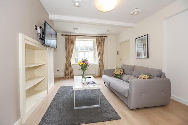 Apartamento família, 2 quartos, para não fumantes, cozinha | Área de estar