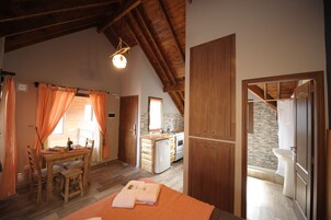 Loft superior | Área de estar | Smart TV 32 polegadas com canais a cabo, dock para MP3