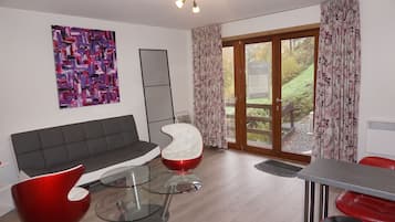 Apartamento | Área de estar | TV de tela plana