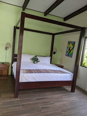 Suíte estúdio família, 1 quarto, acesso à piscina, vista para o jardim | Vista do quarto