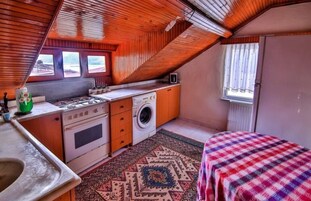 Apartamento, 2 quartos | Kitchenette privada | Um frigorífico 