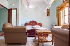 Suíte | Área de estar | TV