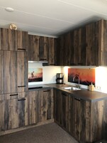 Apartamento conforto, 1 quarto | Roupas de cama premium, frigobar, individualmente decorados