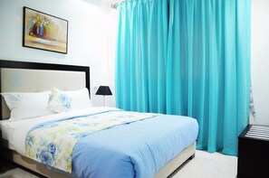 Apartamento, 1 quarto | Escrivaninha, berços grátis, Wi-Fi de cortesia, roupa de cama