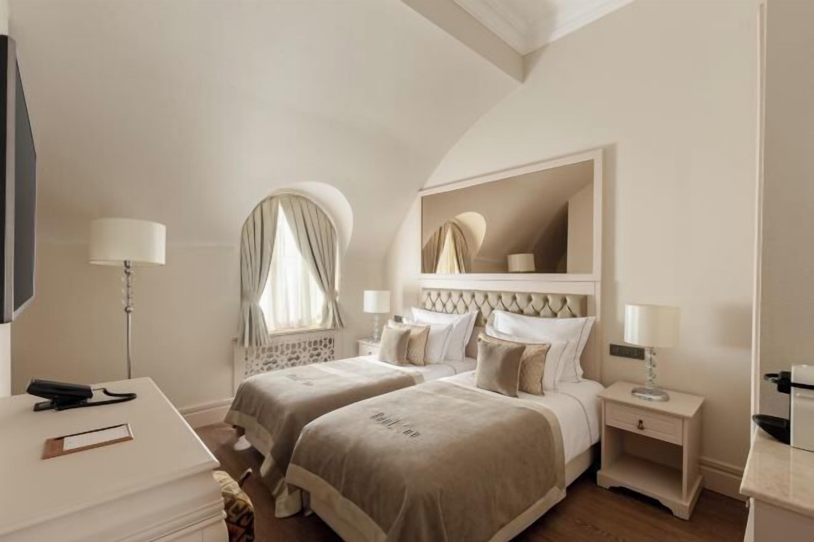 Roupa de alta qualidade, camas de colchão pillowtop, minibar 