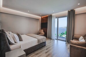 Suite Júnior, 1 cama king-size, vista para a praia | Minibar, secretária, quartos insonorizados, Wi-fi grátis
