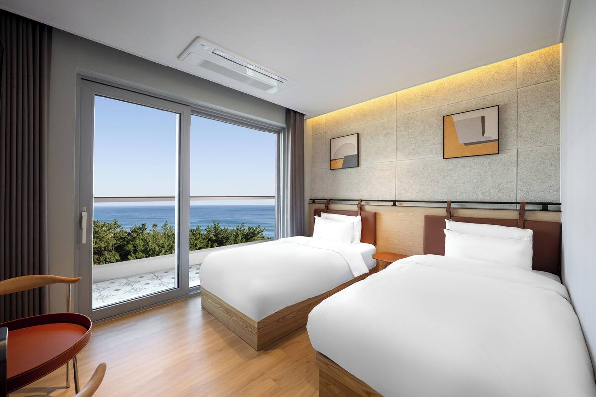Quarto Twin Deluxe, terraço, vista para o oceano | Cortinas/cortinados opacos, Wi-fi grátis 