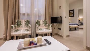 Apartamento, 1 quarto, 2 banheiros (0A) | Área de estar | TV de tela plana