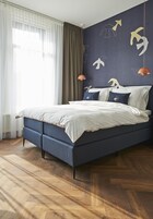 Suíte superior, 1 quarto, cozinha americana | Cofres nos quartos, escrivaninha, ferros/tábuas de passar roupa