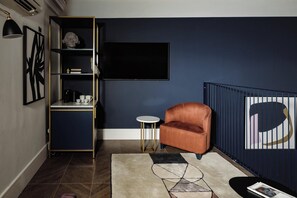 Suíte Júnior | Roupas de cama premium, frigobar, cofres nos quartos