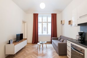 Apartamento Cidade, várias camas, cozinha (   03) | Sala de estar | Televisor 