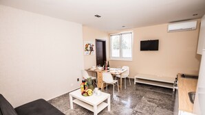 Suite Deluxe, 2 quartos, kitchenette, junto ao pátio