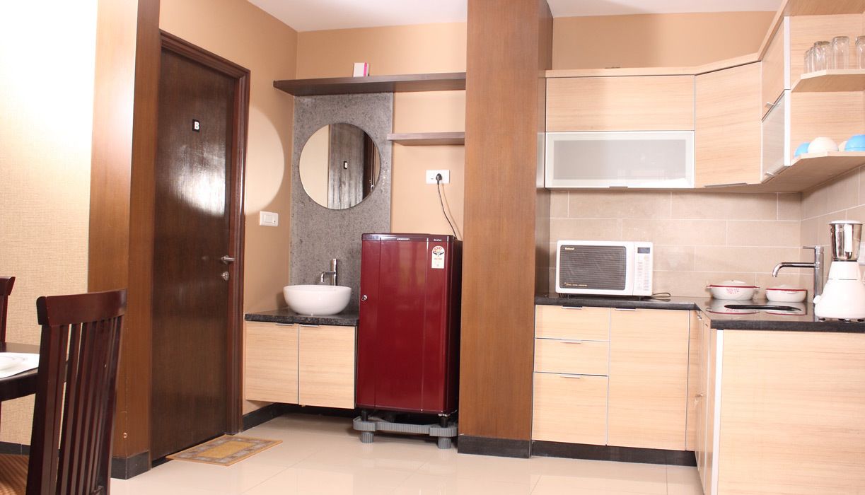 Quarto premium, 1 cama King, vista para a cidade | Cozinha americana privada | Geladeira, micro-ondas (mediante solicitação)