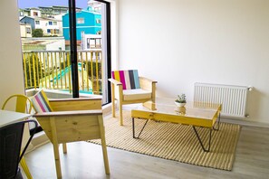 Suite Lua de Mel, 1 quarto | Sala de estar | TV de ecrã plano 