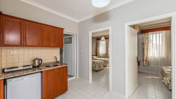 Apartamento, 2 quartos | 2 quartos, secretária, Wi-fi grátis, roupa de cama fornecida