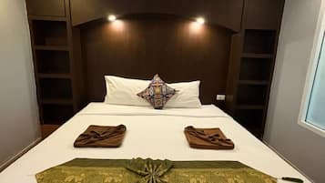 Edredões de penas, camas de colchão Tempur-Pedic, minibar