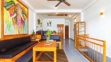 Apartamento, 2 quartos, vista para o oceano | Sala de estar