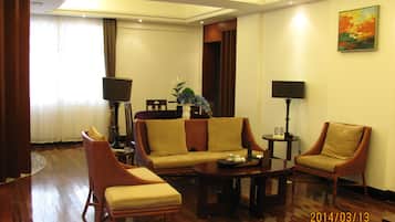 Suíte executiva | Sala de estar | TV