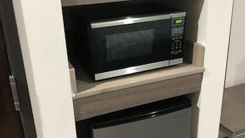 Quarto Individual Deluxe, 1 cama king-size, não fumadores | Minifrigorífico