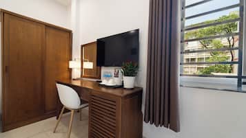 Quarto triplo superluxo, várias camas, vista para a cidade | Roupas de cama premium