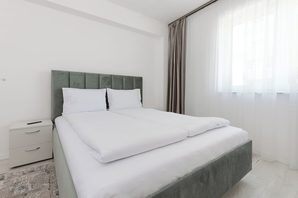 Deluxe Apartment (Emerald) | 2 quartos, roupas de cama antialérgicas, frigobar, cofres nos quartos