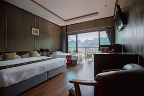 Quarto duplo luxo | Frigobar, cortinas blackout, Wi-Fi de cortesia