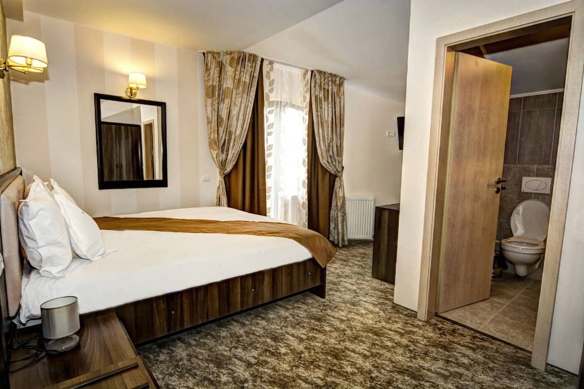 Quartos insonorizados, berço de viagem, Wi-fi grátis
