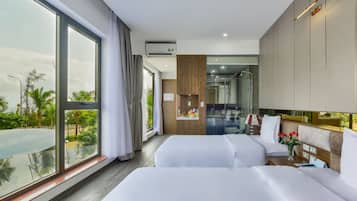 Quarto Duplo Deluxe para 1 Pessoa, vista parcial para o oceano | Camas de colchão viscoelástico, minibar, cofre no quarto, secretária